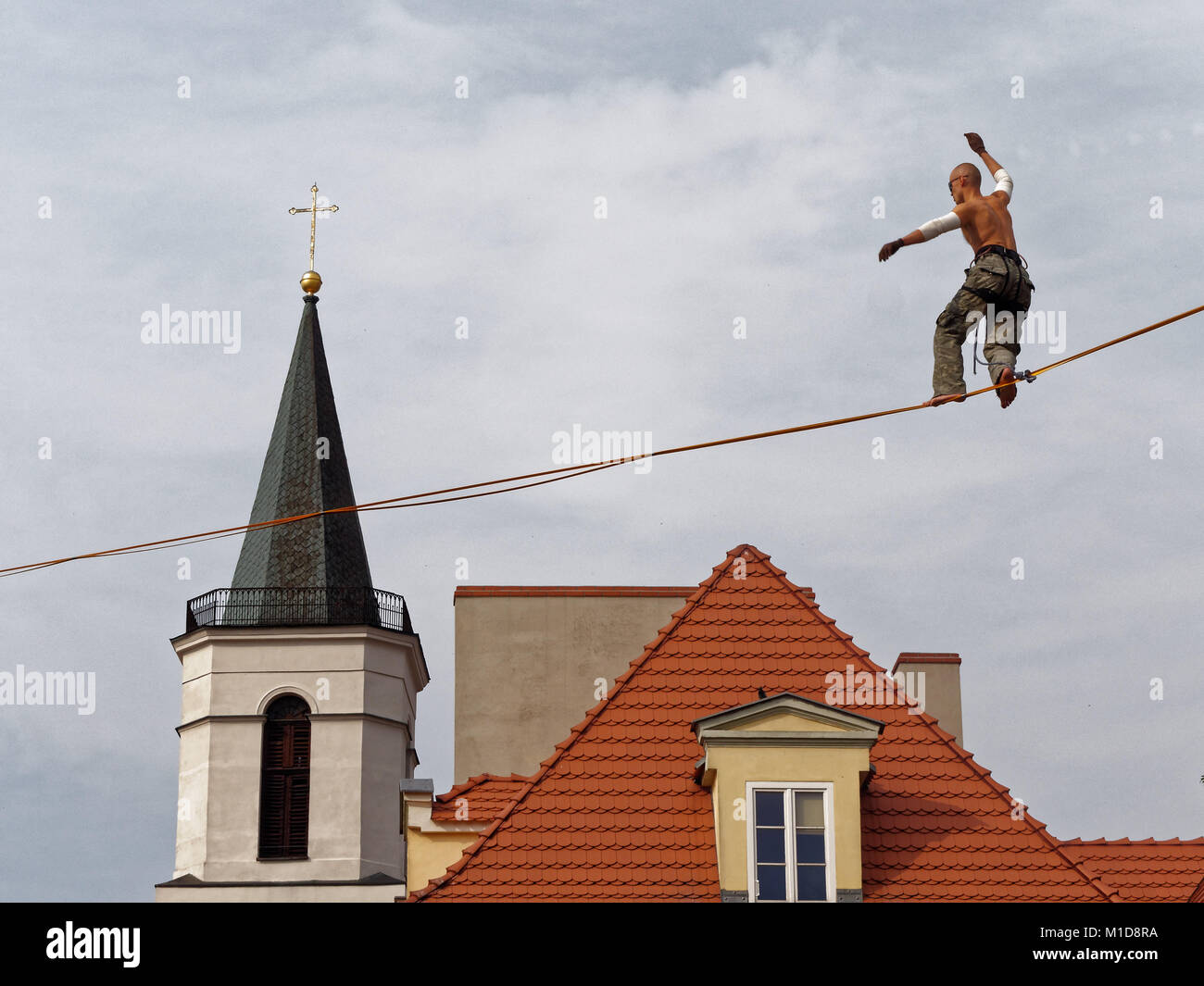 Walking the tightrope hi-res stock photography and images - Alamy