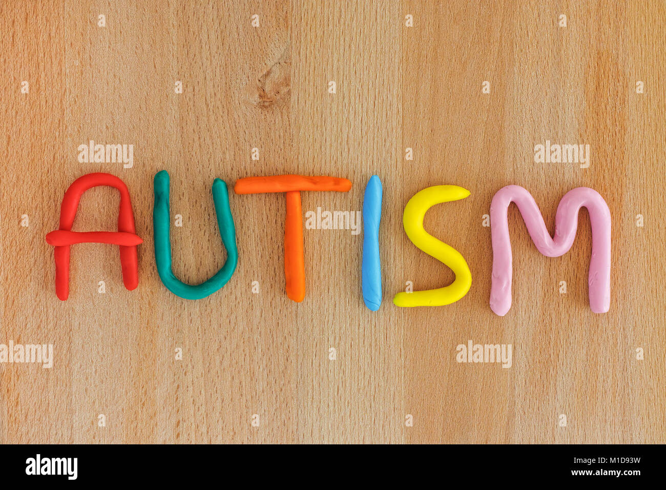 Autism. Autism spectrum disorder. Autism word made out of playdough ...