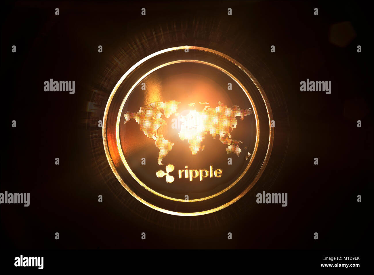 digital ripple coin glowing in the dark Stock Photo - Alamy