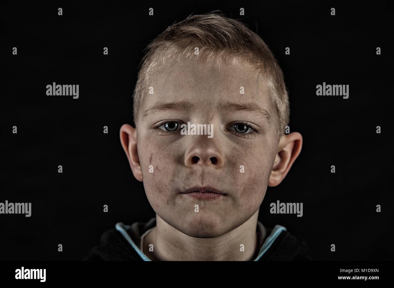 sad young boy Stock Photo - Alamy