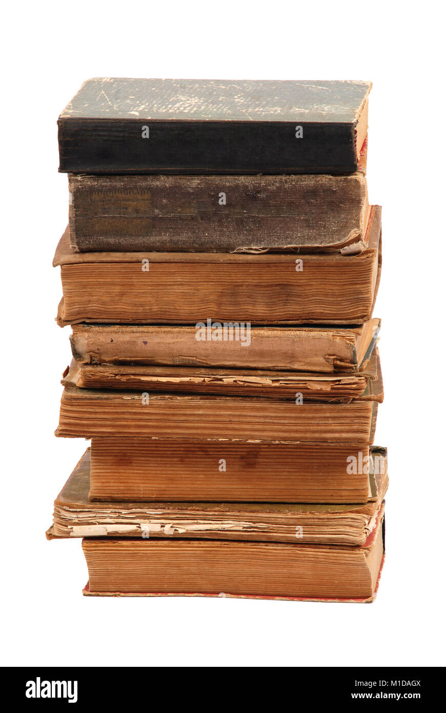 Stacked old books of different shape and color. Isolated on white ...