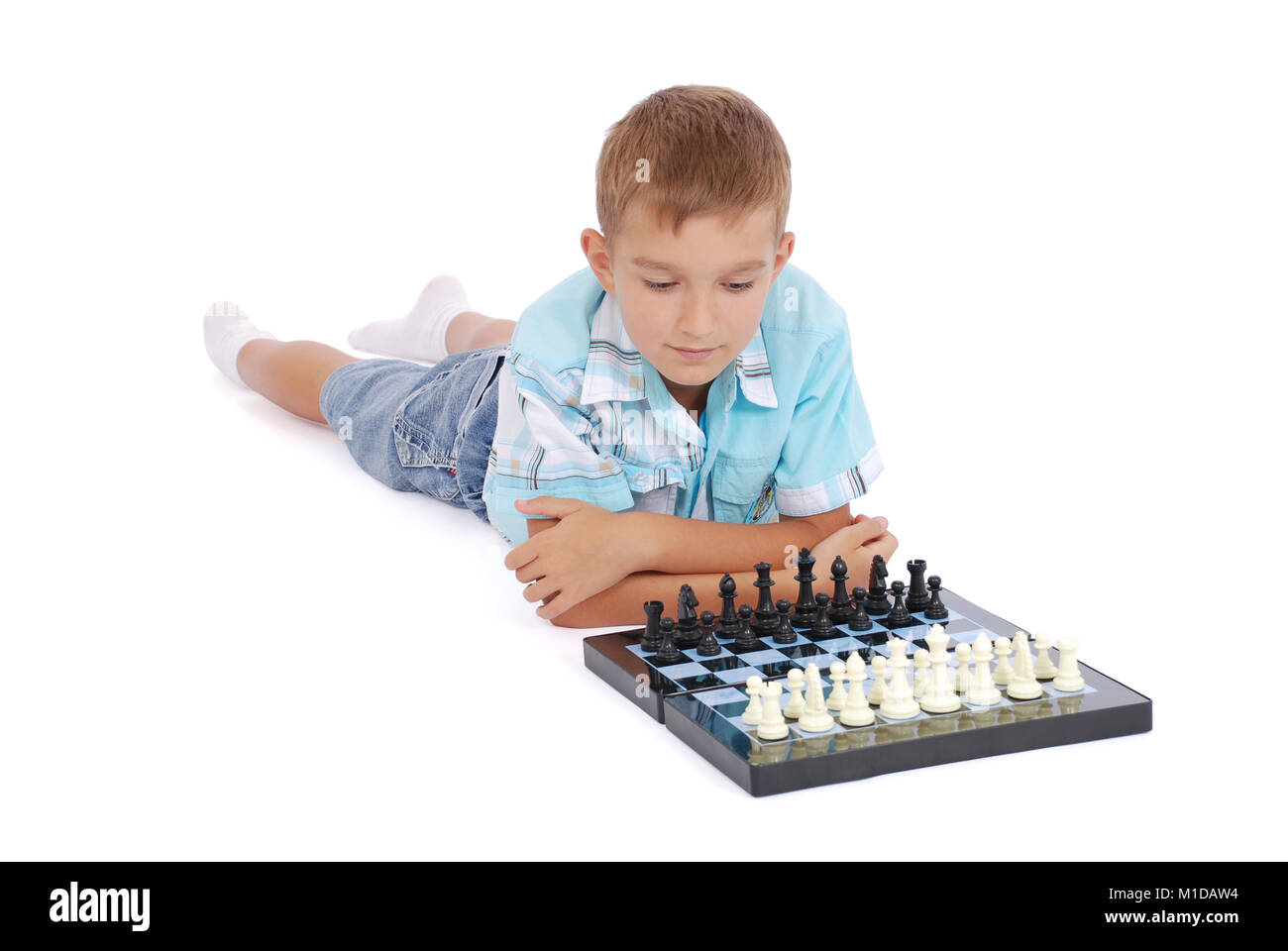 Boy Playing Chess on white backdround Stock Photo - Alamy
