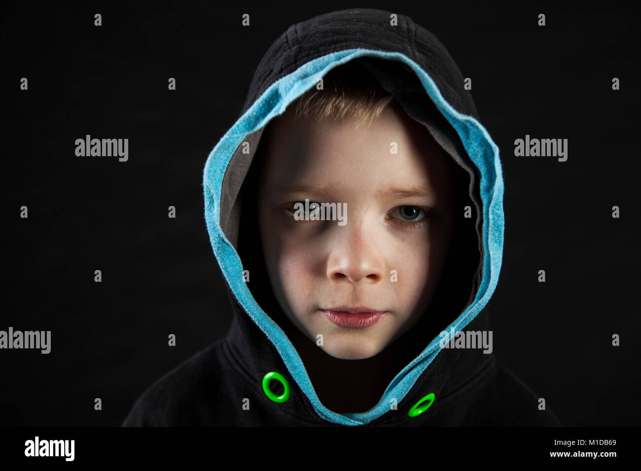 sad young boy Stock Photo - Alamy