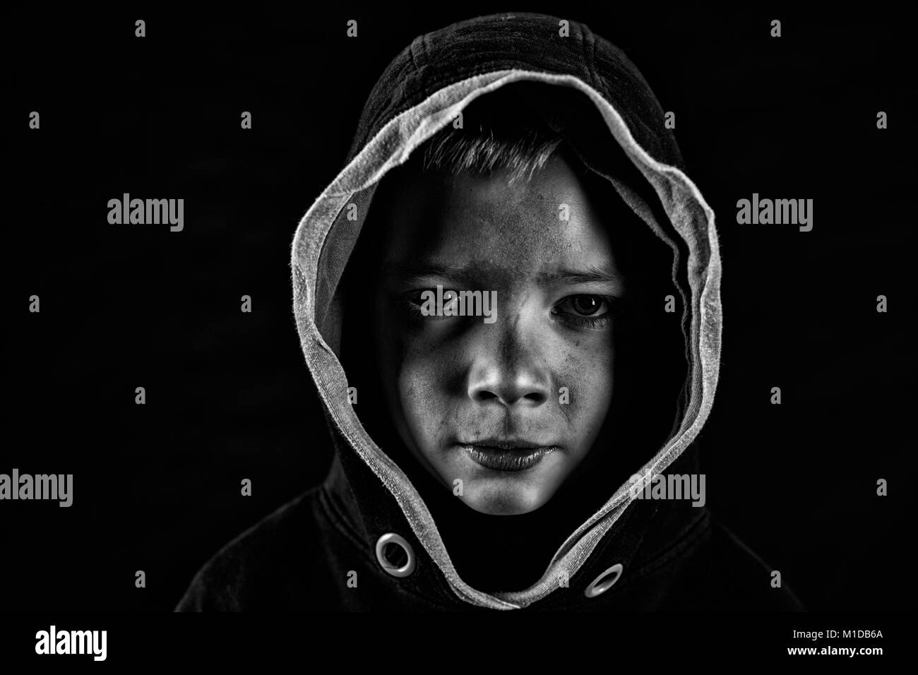 sad young boy Stock Photo - Alamy