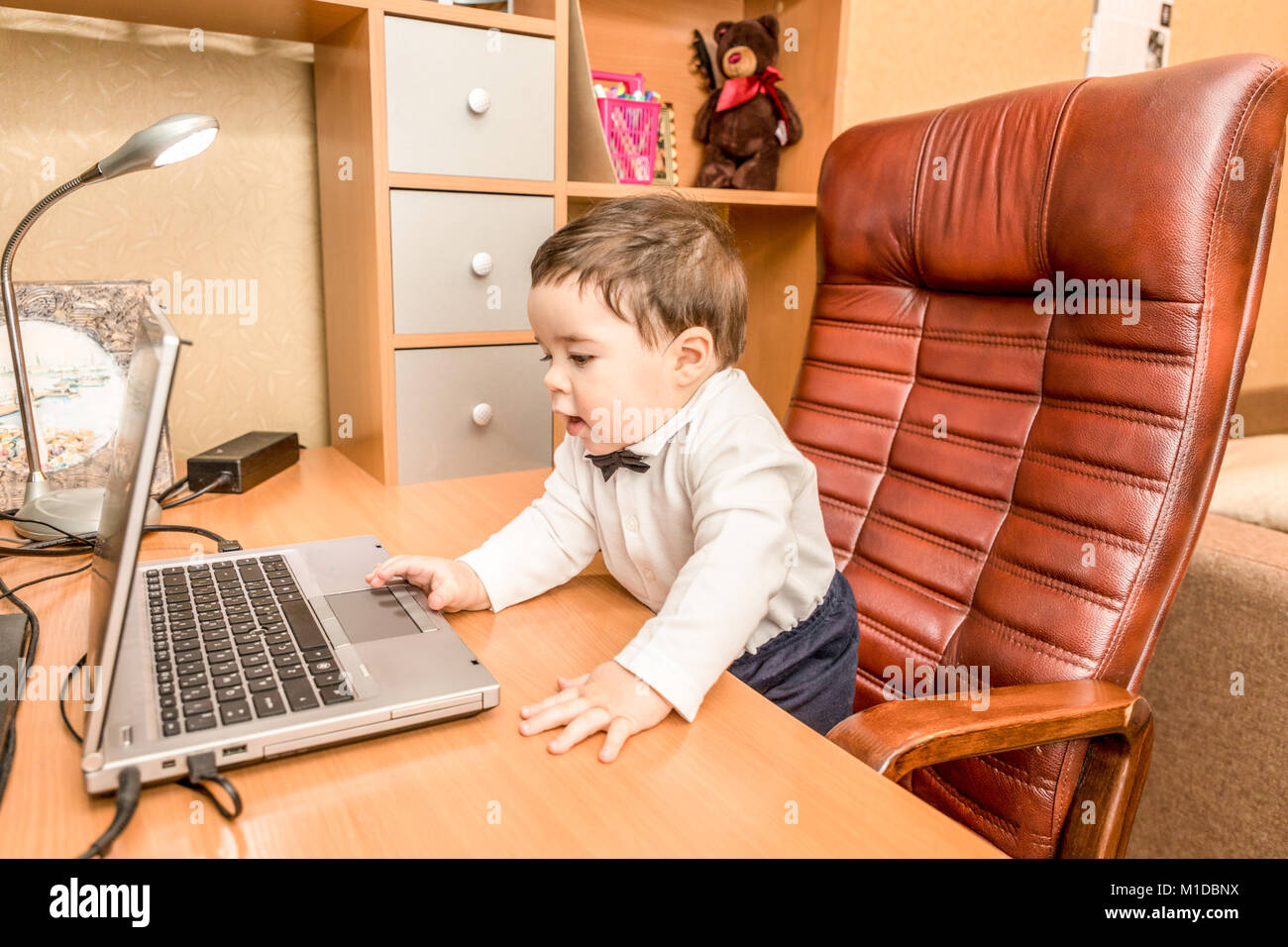Little boy with notebook Stock Photo - Alamy