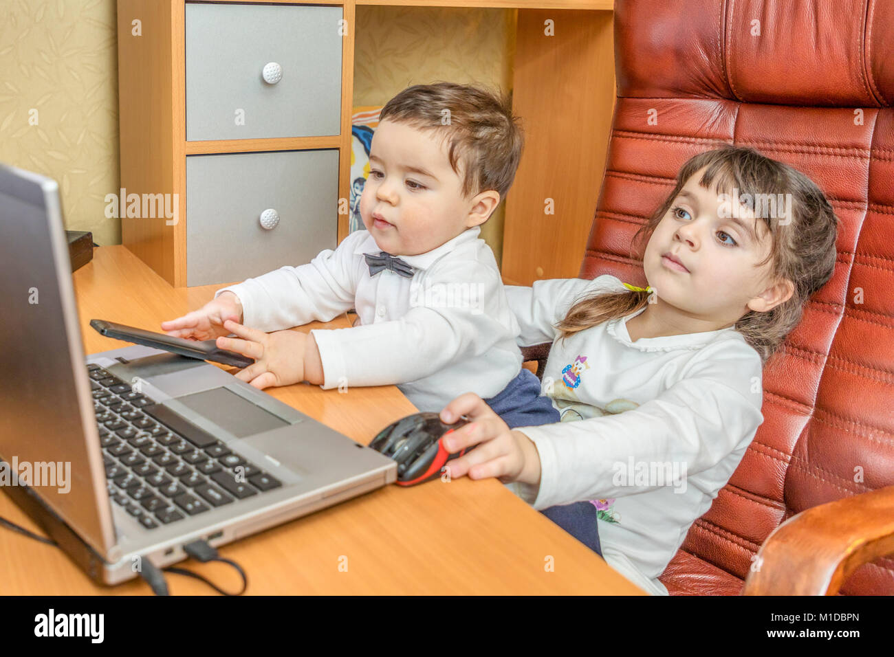 Little children with notebook Stock Photo - Alamy