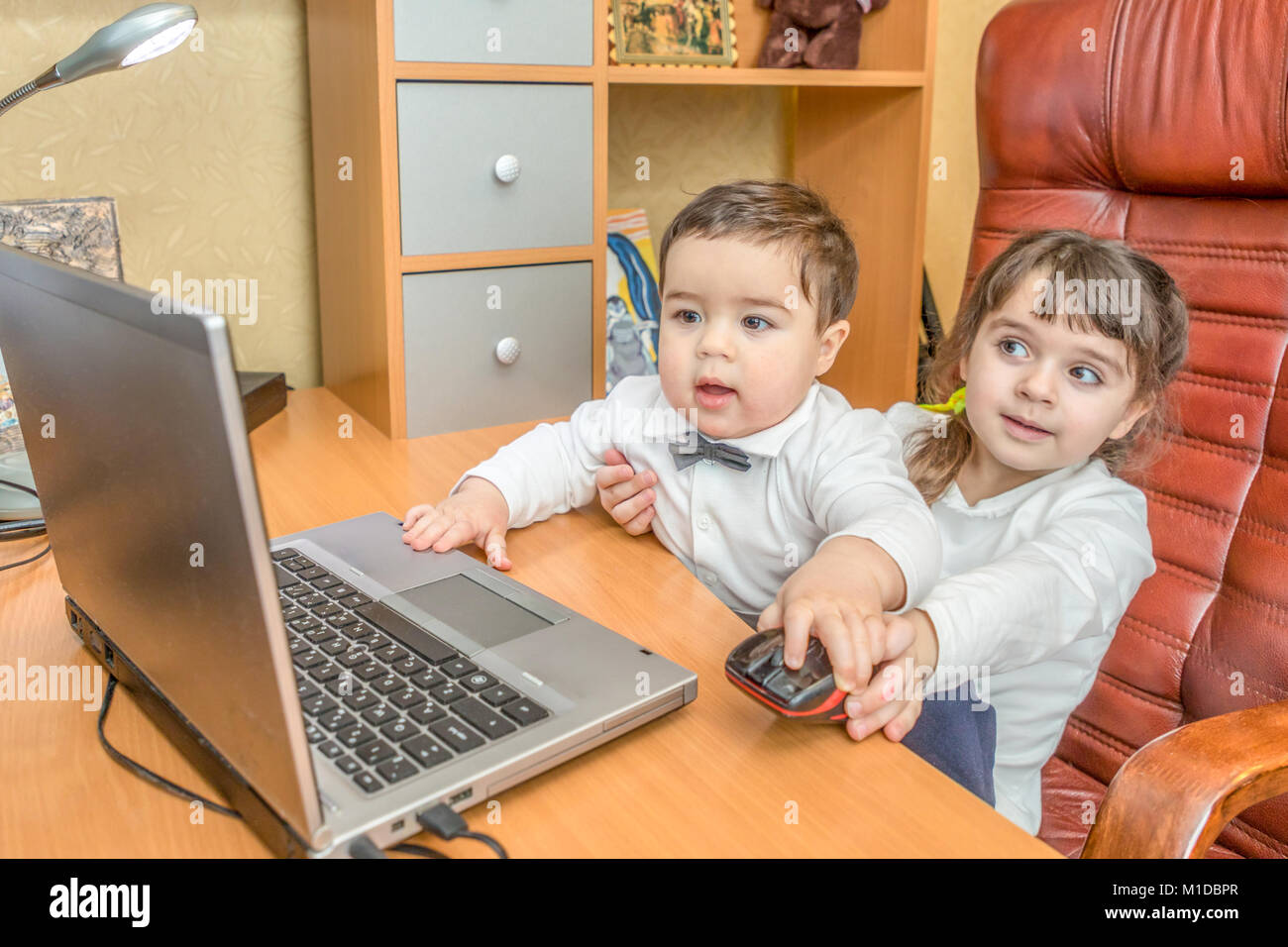 Little children with notebook Stock Photo - Alamy