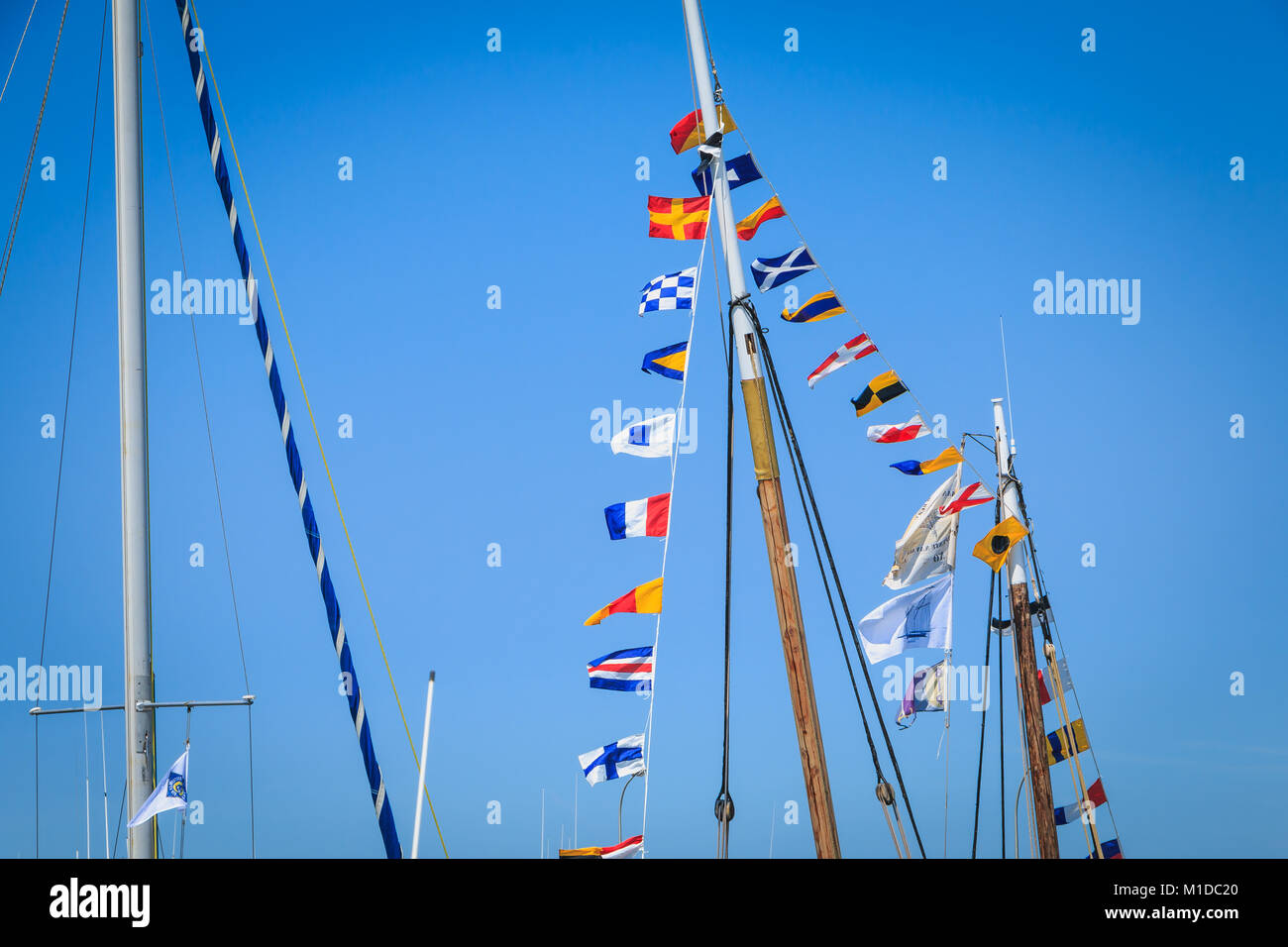 NOIRMOUTIER, FRANCE - August 15, 2016 : set of pennants on the mast of ...