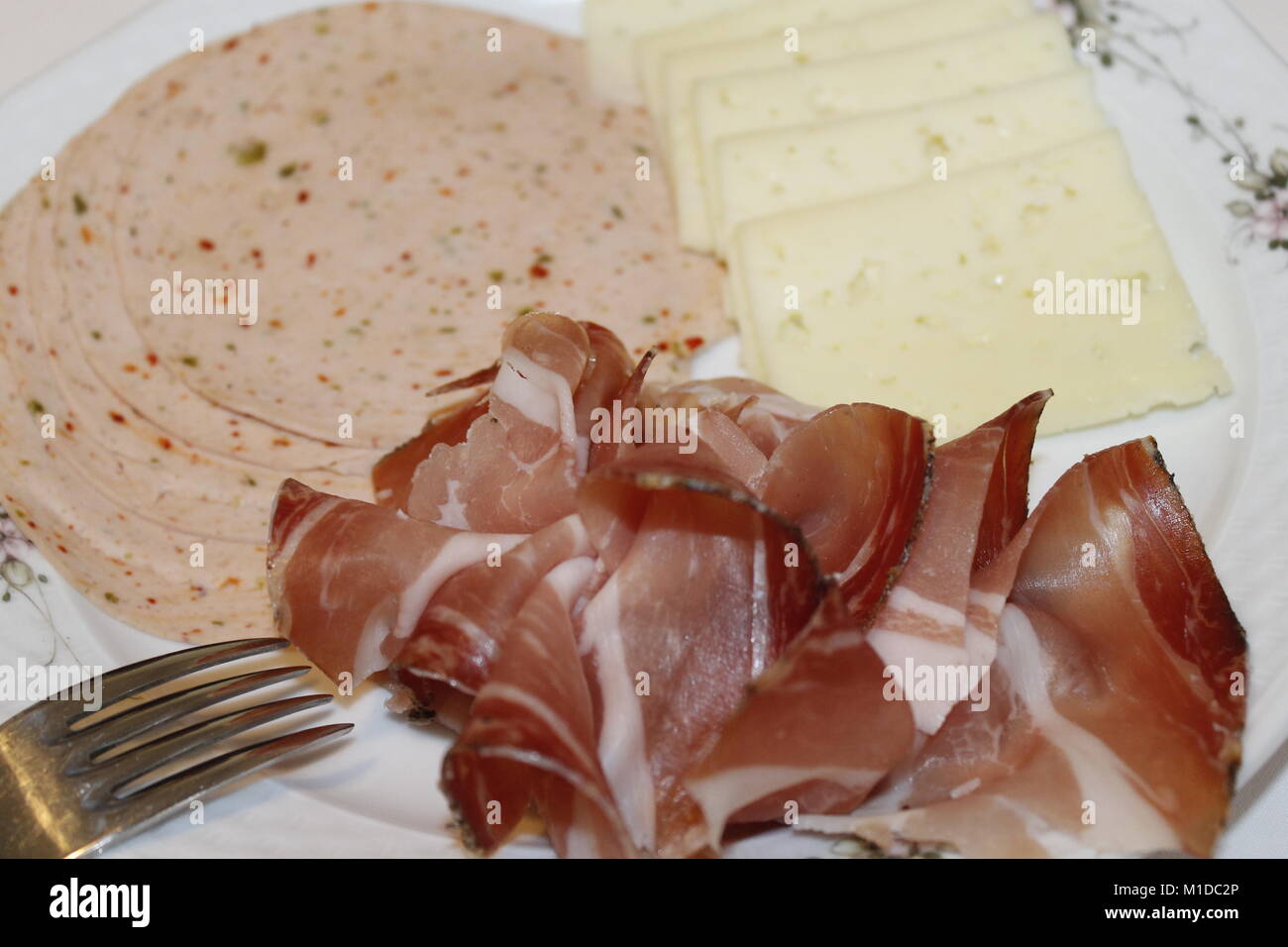 typical Alps breakfast, various types of cold cuts Stock Photo - Alamy