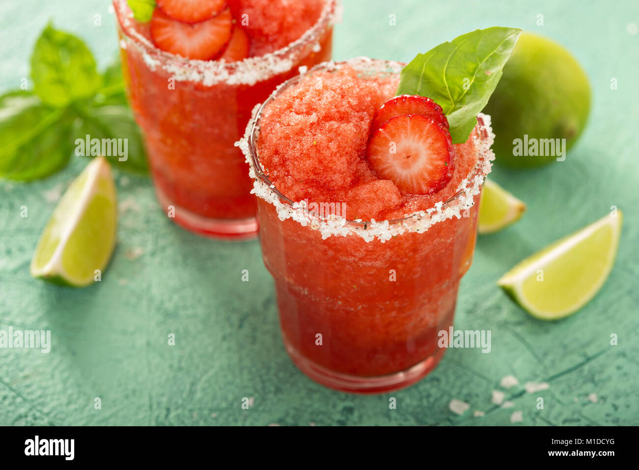 Frozen strawberry lime margarita Stock Photo - Alamy