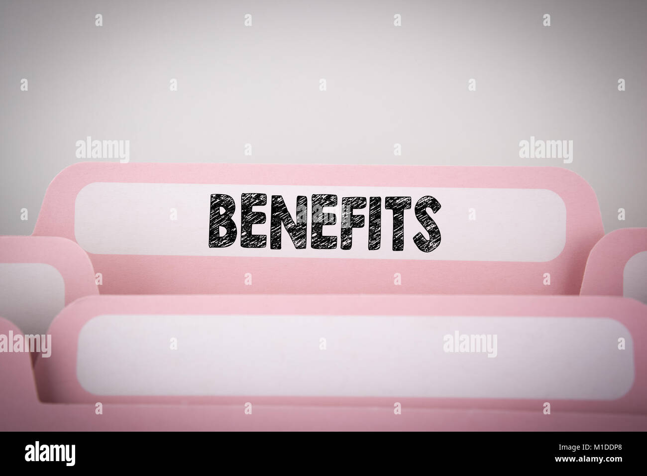 Benefits. Word on Folder Register. business background Stock Photo - Alamy