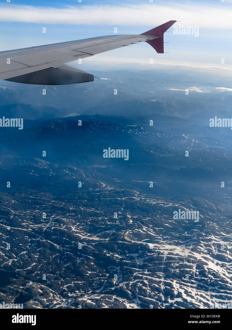 Birds eye. View from window of plane airplane flying over Norway ...