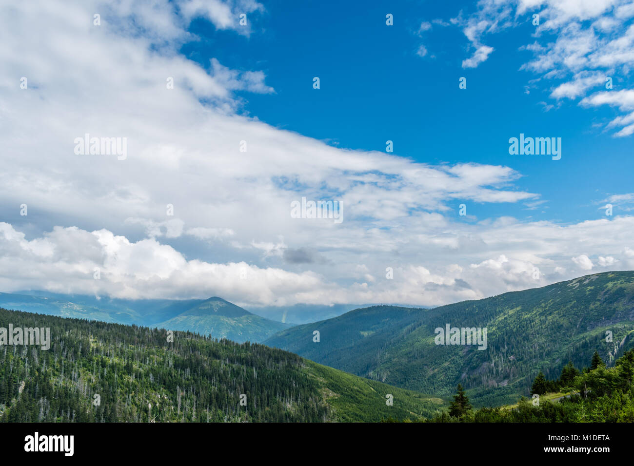 Beautiful view from mountains to the horizon with mountains and green ...
