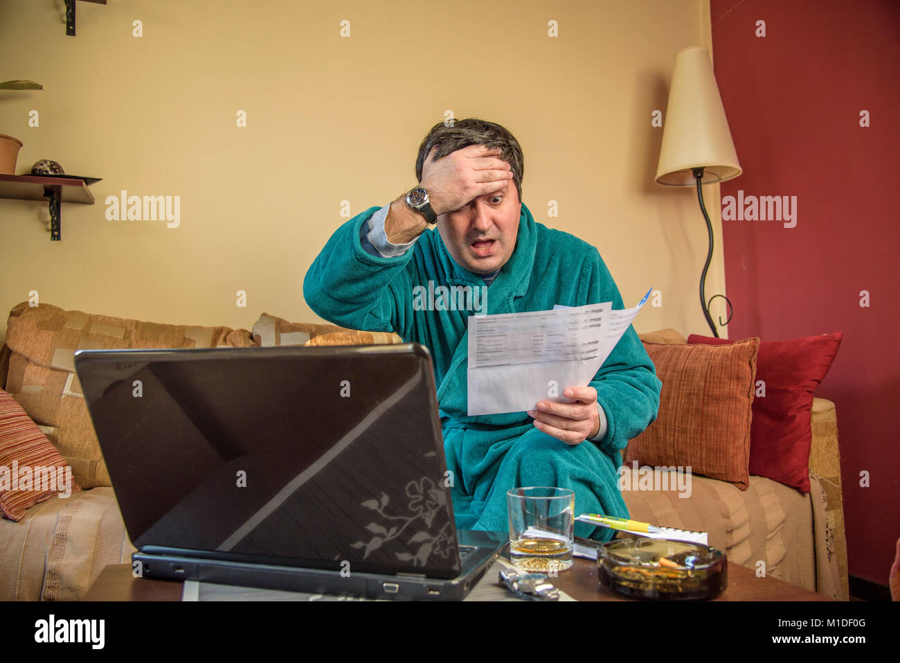 Too much money for bills Stock Photo - Alamy