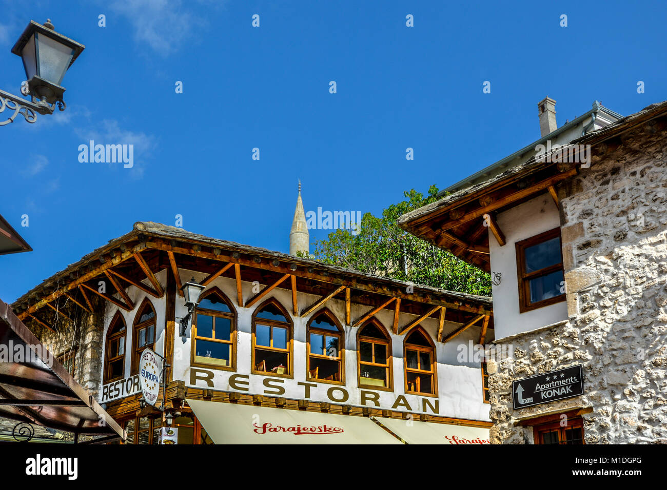 A restaurant cafe in the tourist center of Old Town Mostar, Bosnia and ...