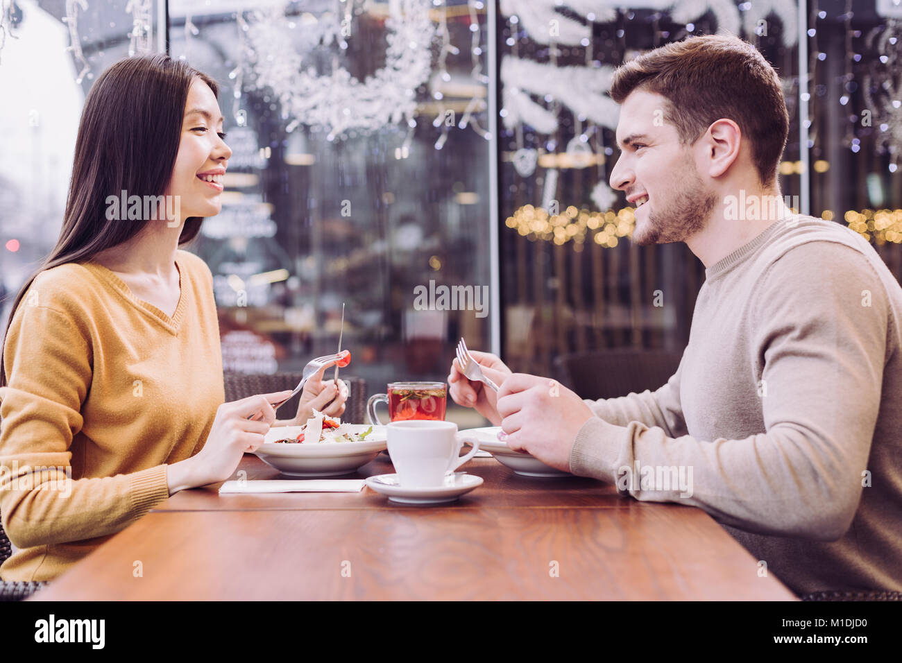 Sweet adorable couple has date Stock Photo - Alamy