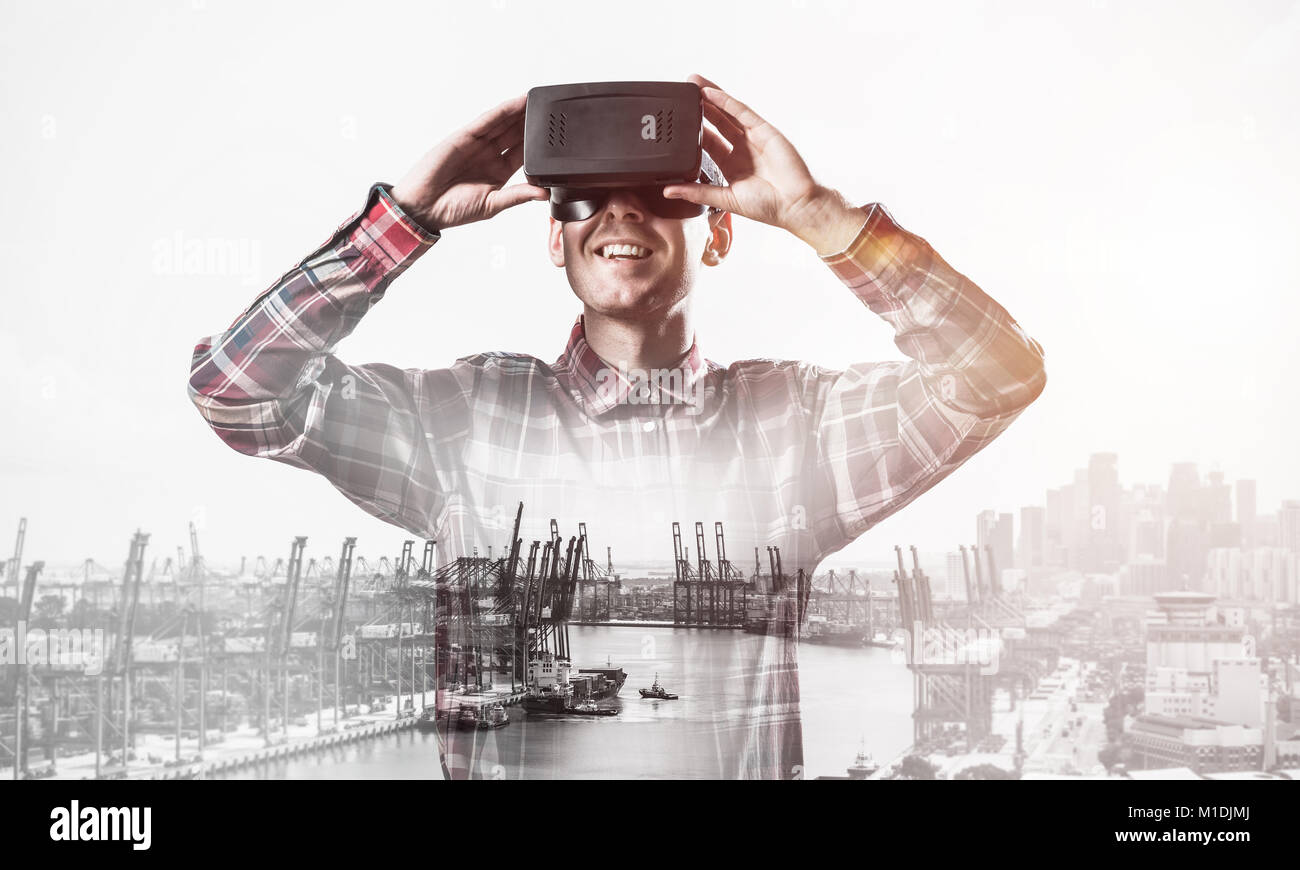 Guy wearing checked shirt and virtual mask demonstrating some em Stock ...