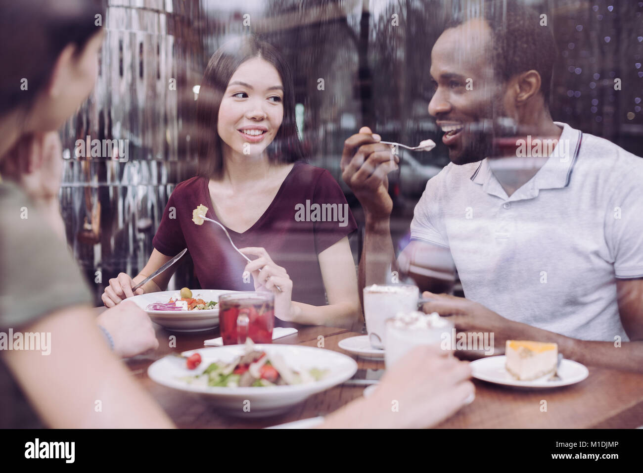 Young three friends debating over issue Stock Photo - Alamy