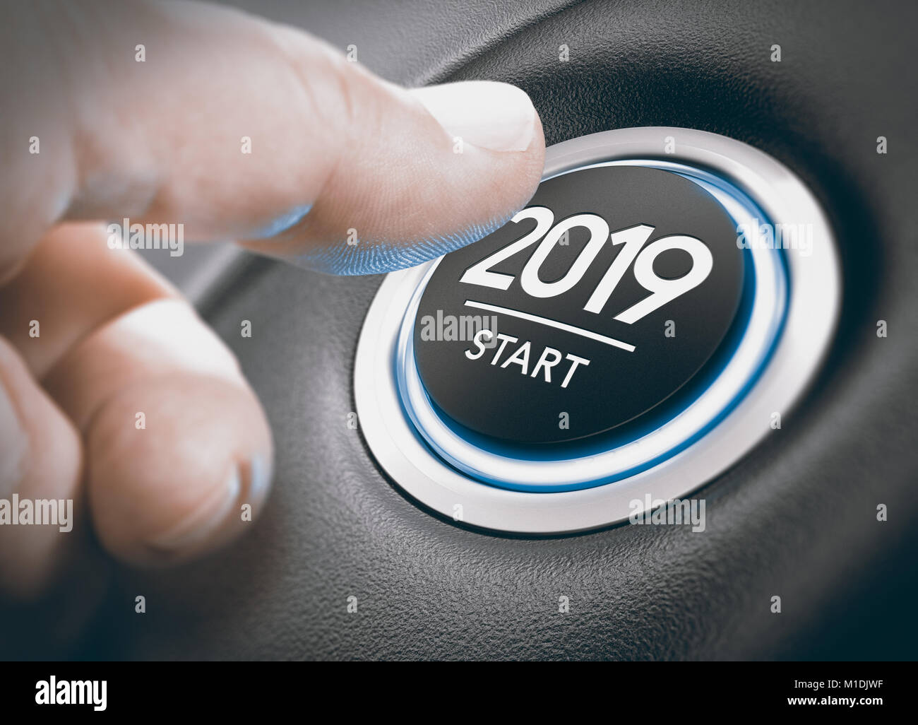 Finger pressing a 2019 start button. Concept of new year, two thousand ...