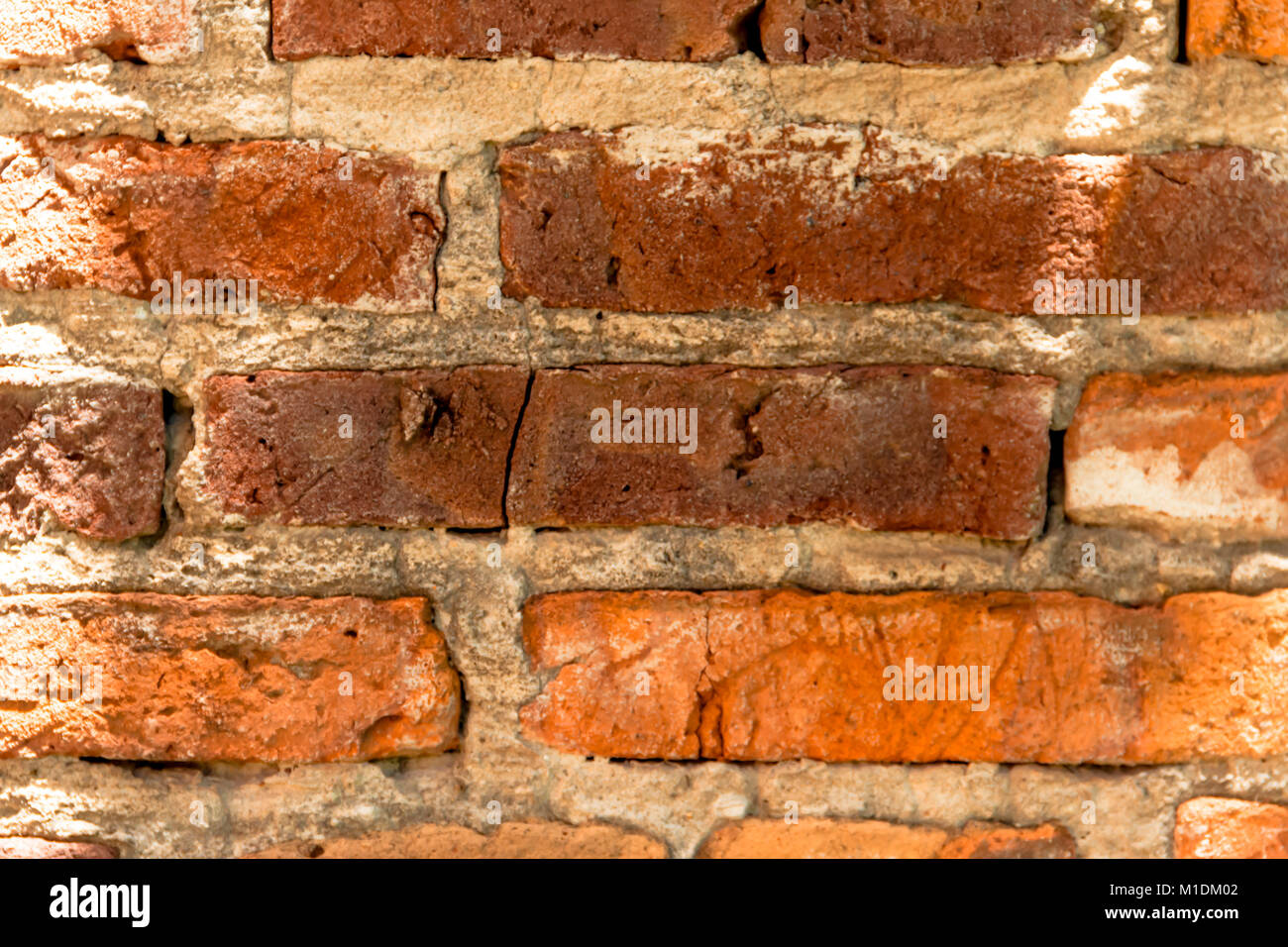 background of uneven old bricks with shadows Stock Photo - Alamy