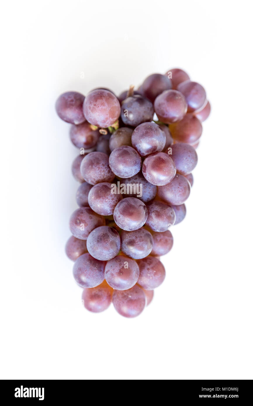 Bunch of ripe red grapes isolated on white background, flat lay Stock ...