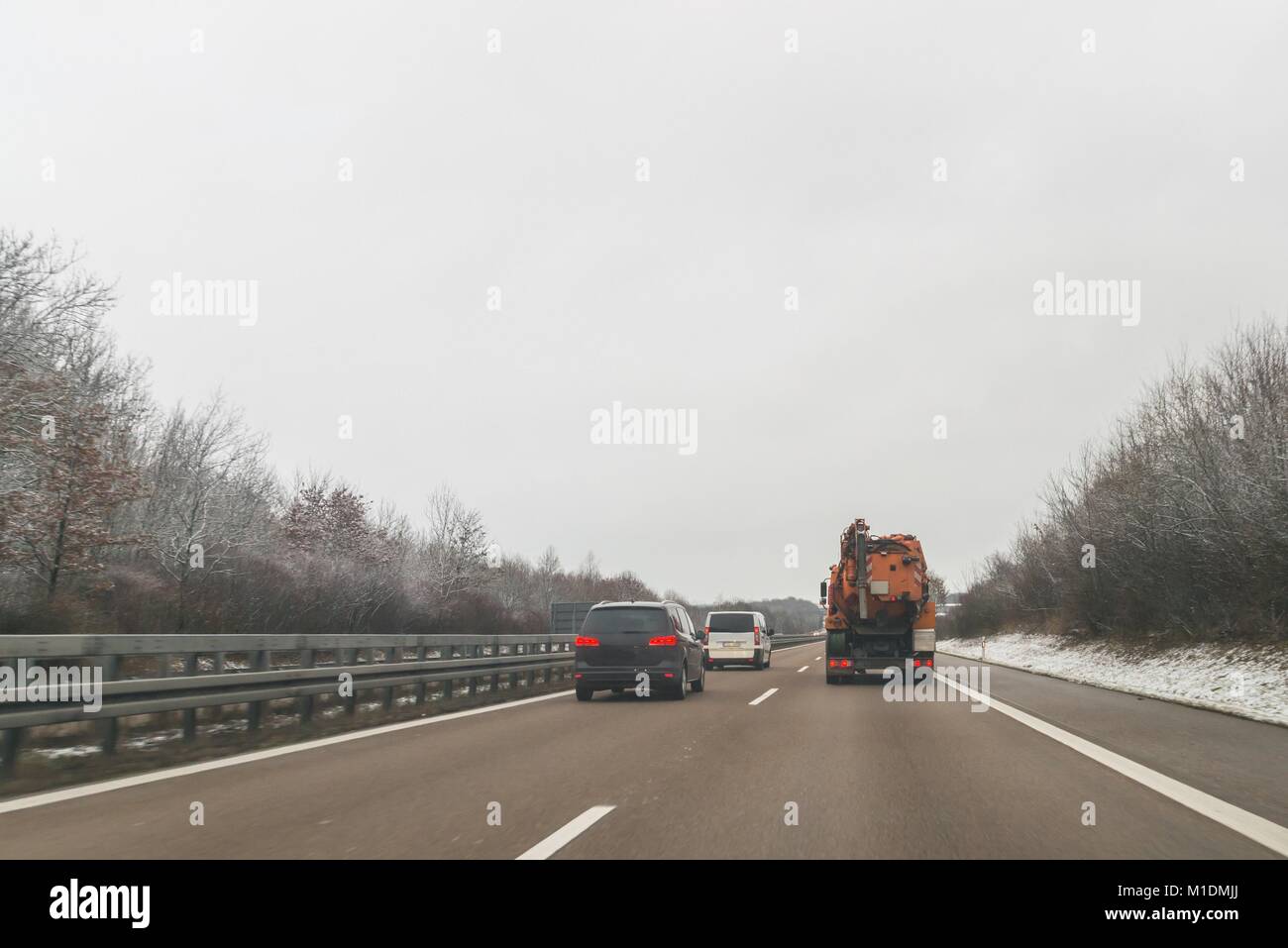 Cars and special purpose vehicle for wet waste disposal on an autobahn ...