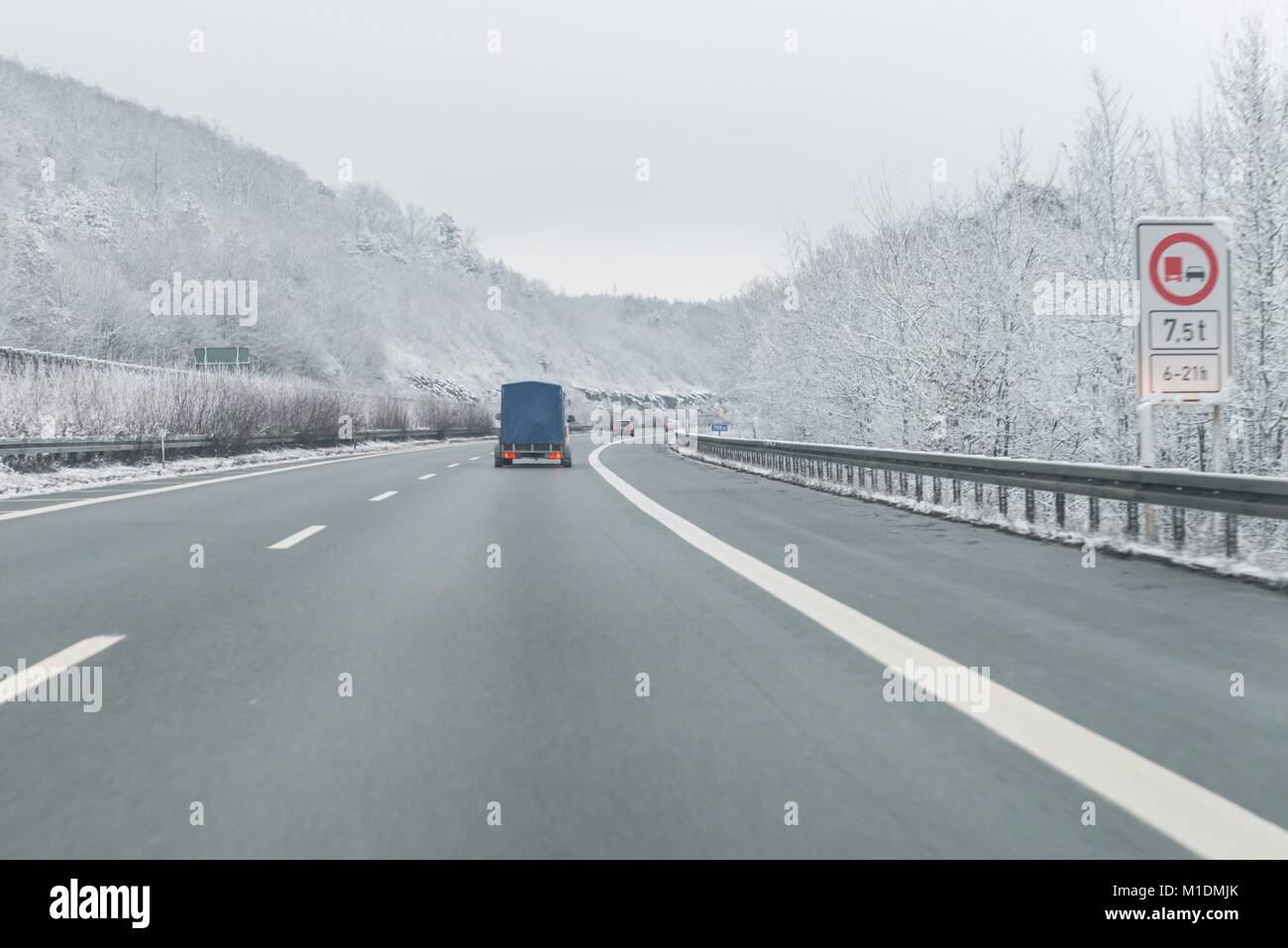 Cars with trailer on the autobahn, Germany Stock Photo - Alamy