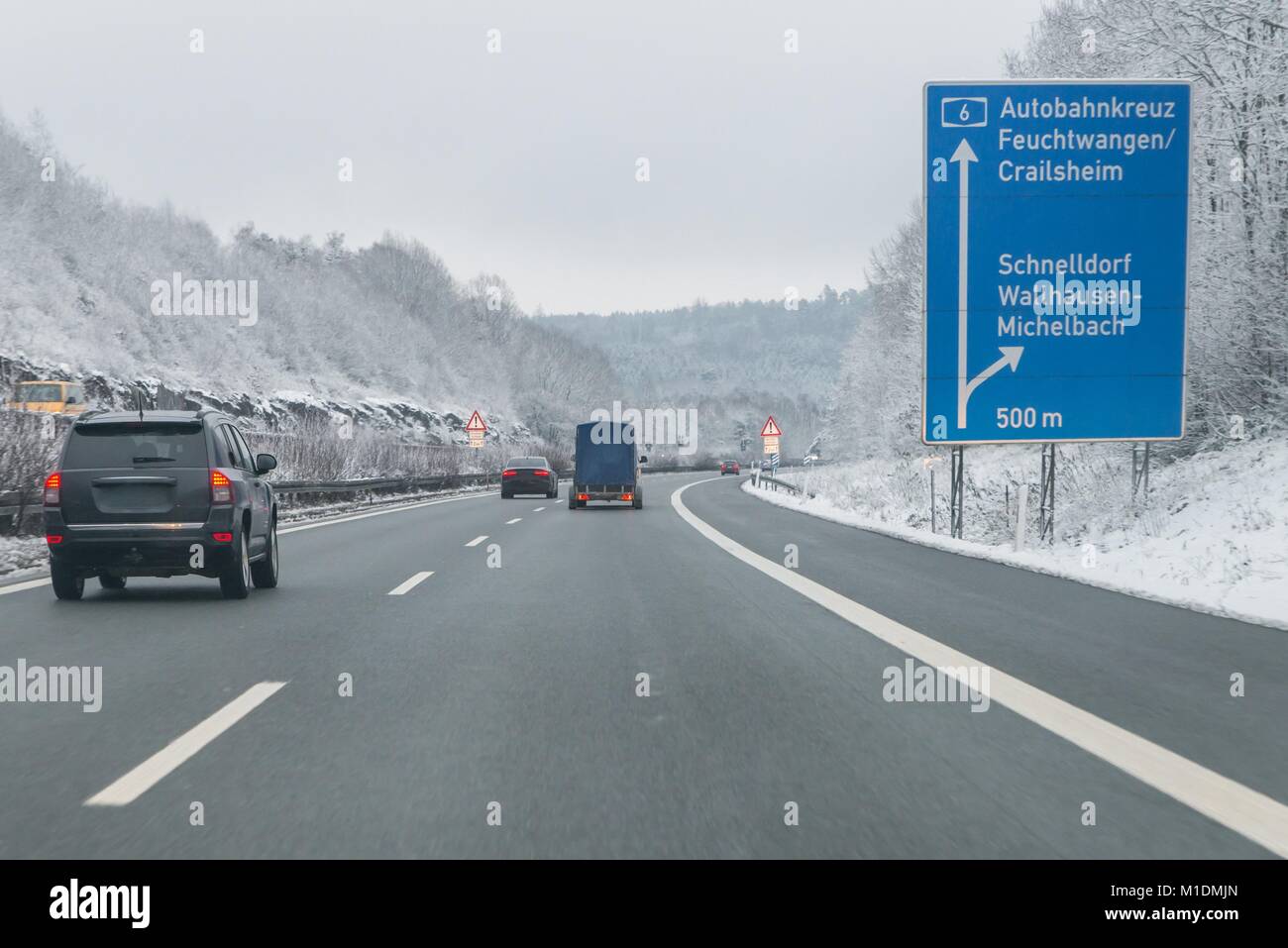 Cars with trailer on the autobahn, Germany Stock Photo - Alamy