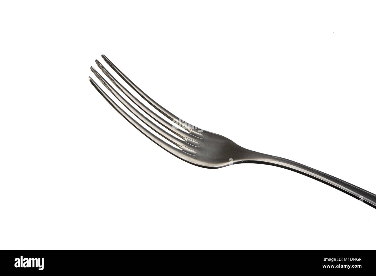 Metal fork on a white background. Isolated object Stock Photo - Alamy