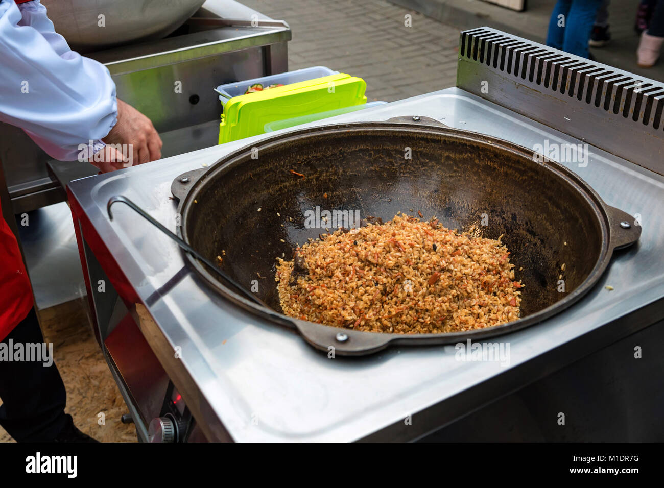 Cooking rice pilau in large bowl Stock Photo - Alamy