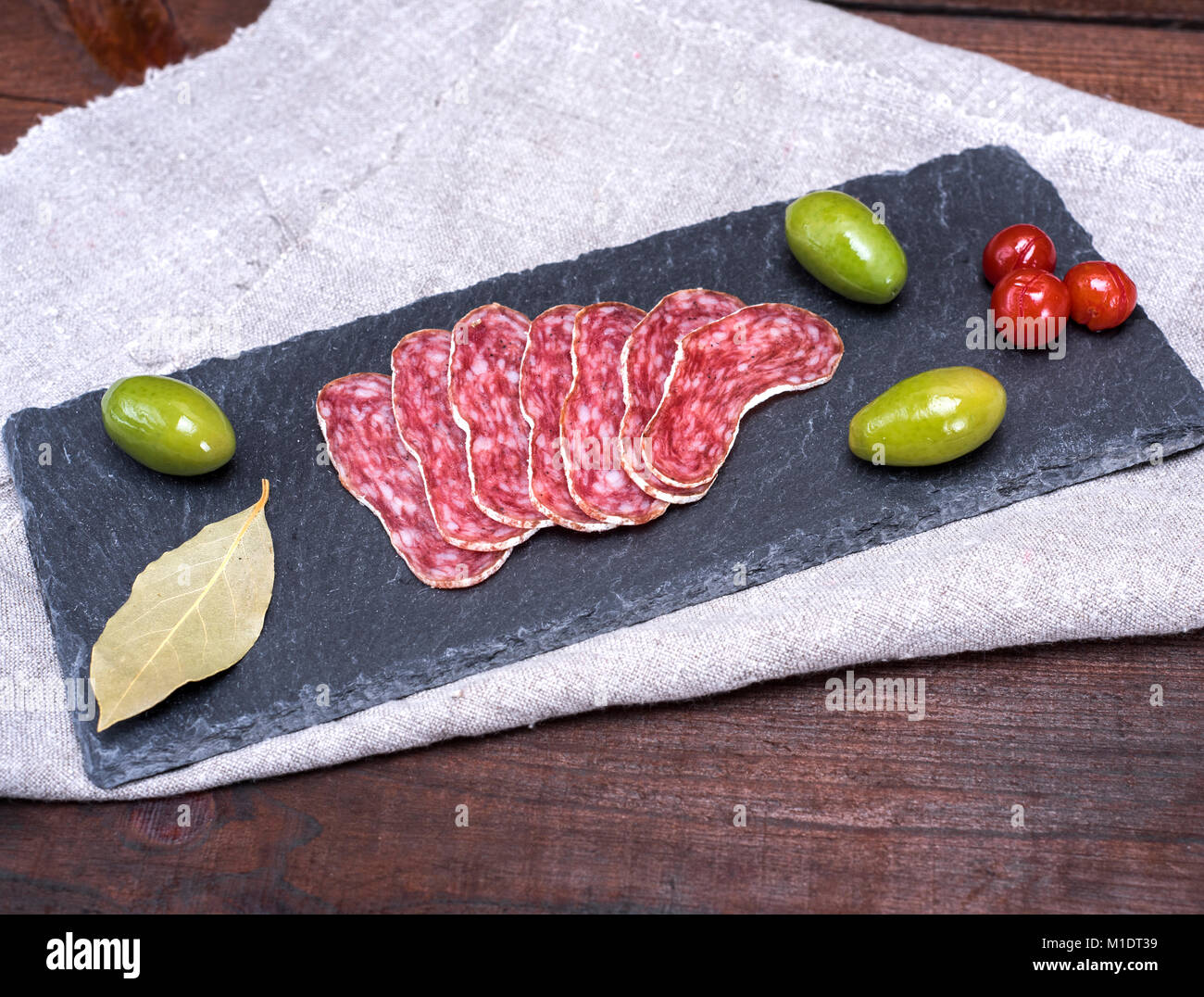 sliced smoked salami, top view Stock Photo - Alamy