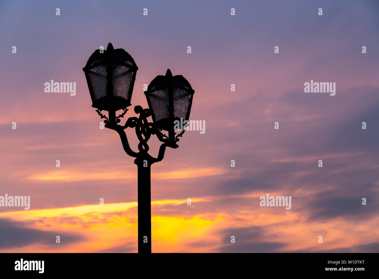 street lantern on sunset sky background Stock Photo - Alamy