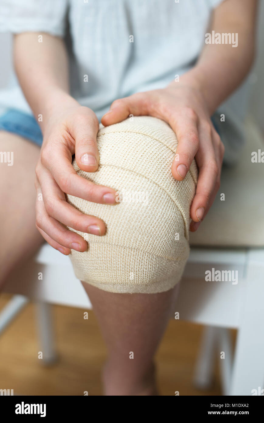 Child knee with elastic bandage on it Stock Photo - Alamy