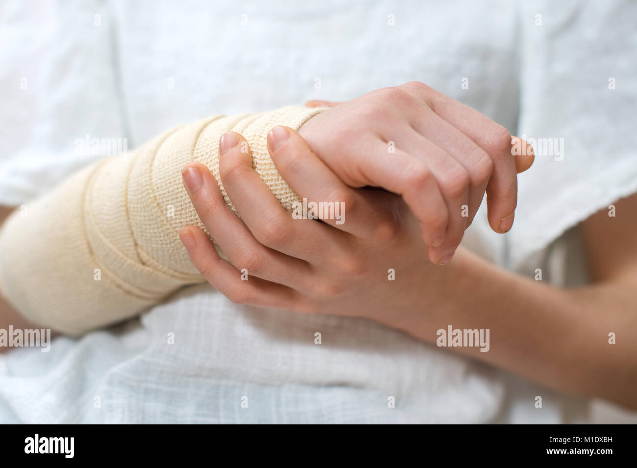 Arm bandage broken girl hi-res stock photography and images - Alamy