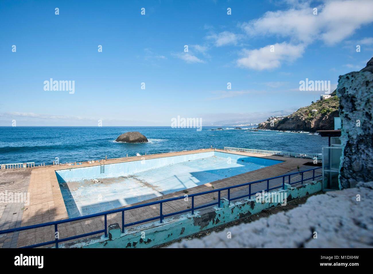 Old dilapidated open-air swimming pool on the coast of Las Aguas Stock ...