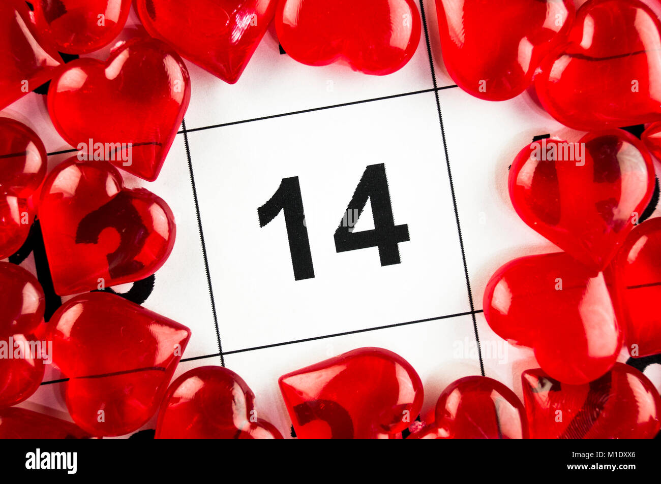 February 14 with a red heart symbol holiday background Stock Photo - Alamy