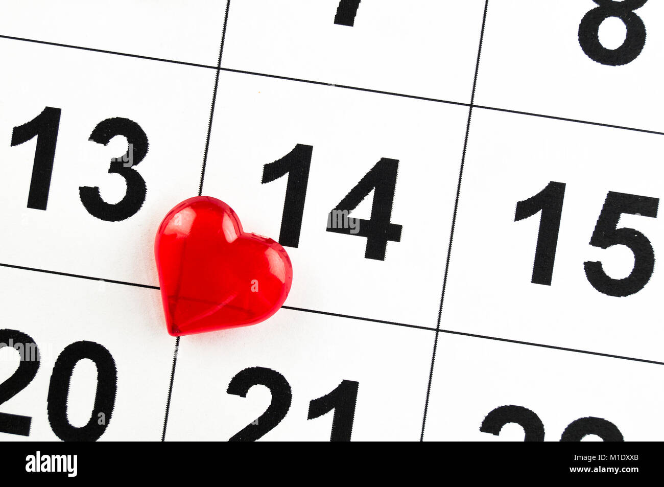 February 14 with a red heart symbol holiday background Stock Photo - Alamy