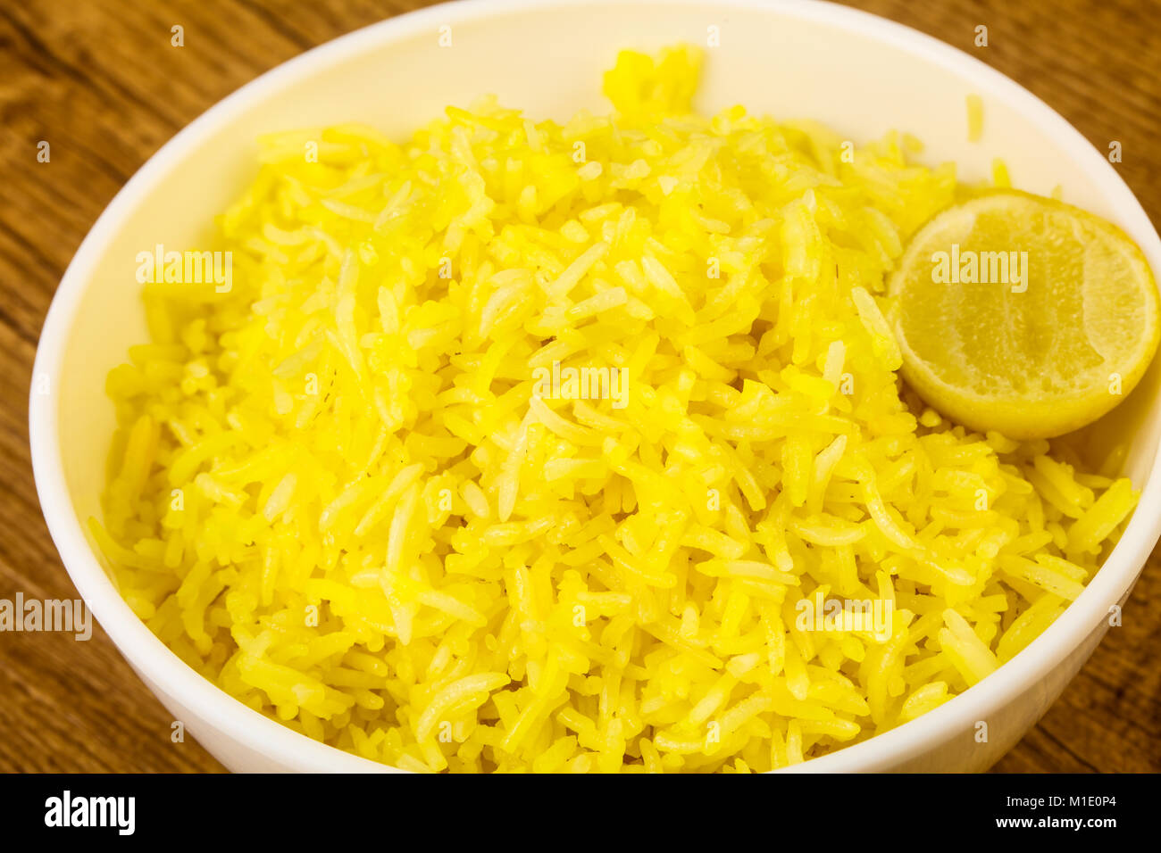 Indian traditional cuisine - Yellow Rice with Lime Stock Photo - Alamy