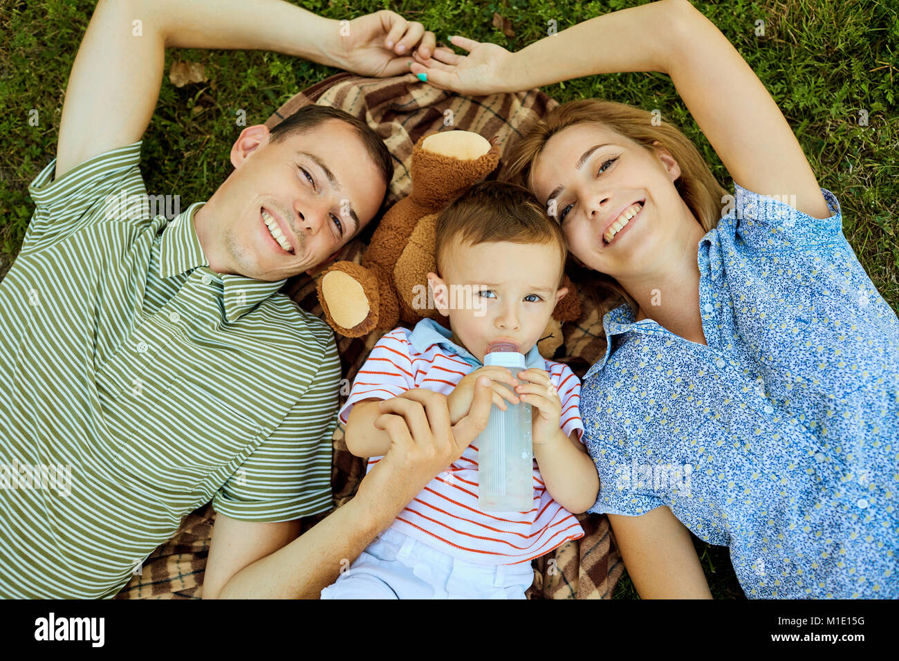Happy family in nature Stock Photo - Alamy