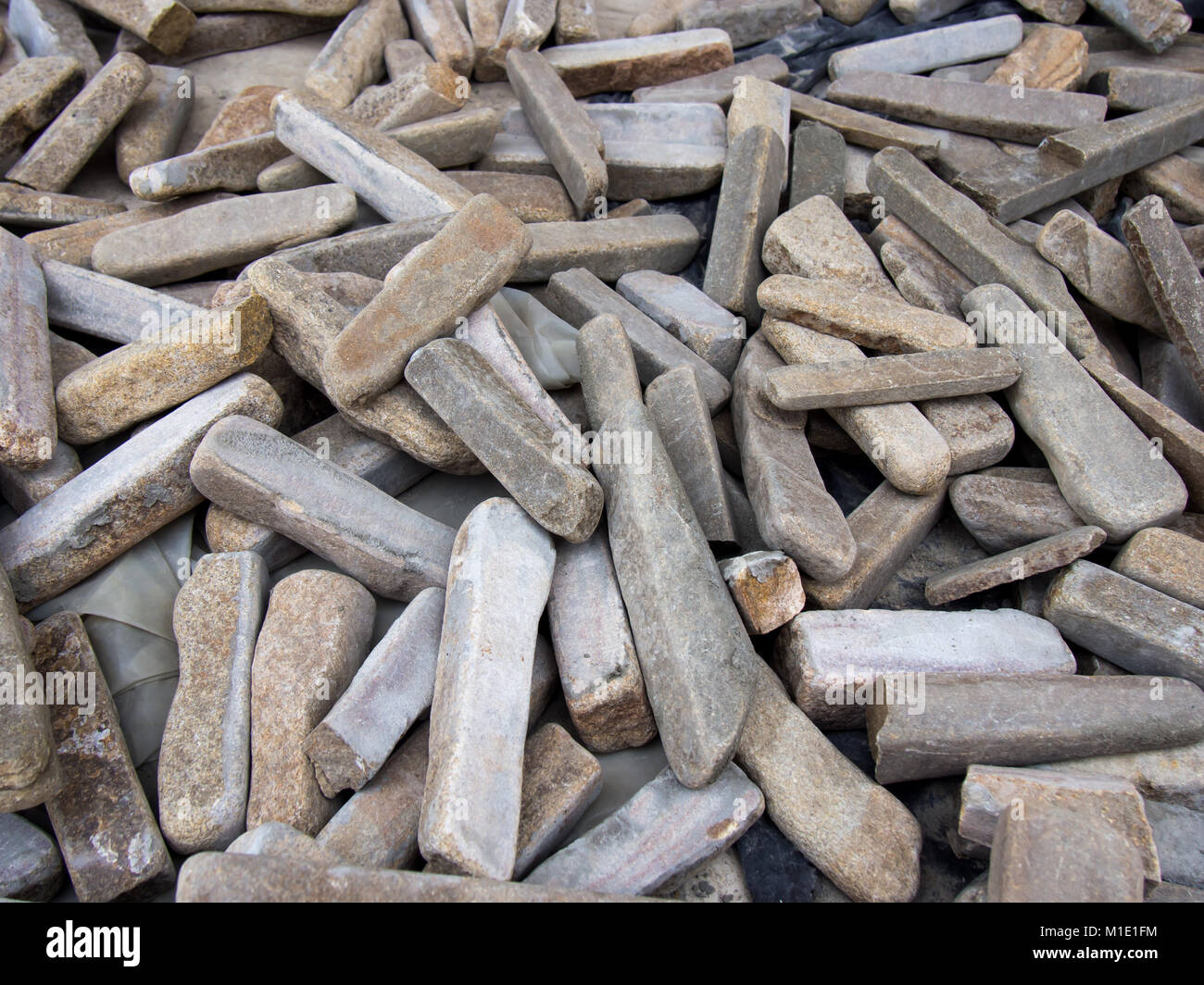 A pile of sticks from a natural stone cladding Stock Photo - Alamy