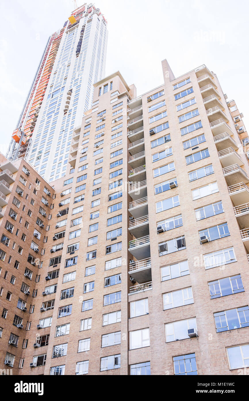 Residential apartment brownstone brick building skyscraper exterior in ...