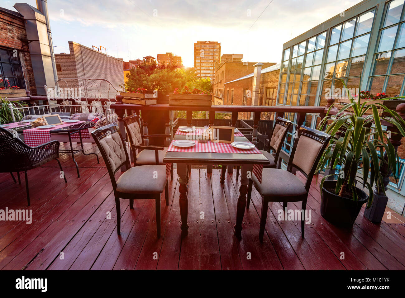 Dinner table set balcony sunset restaurant hi-res stock photography and ...