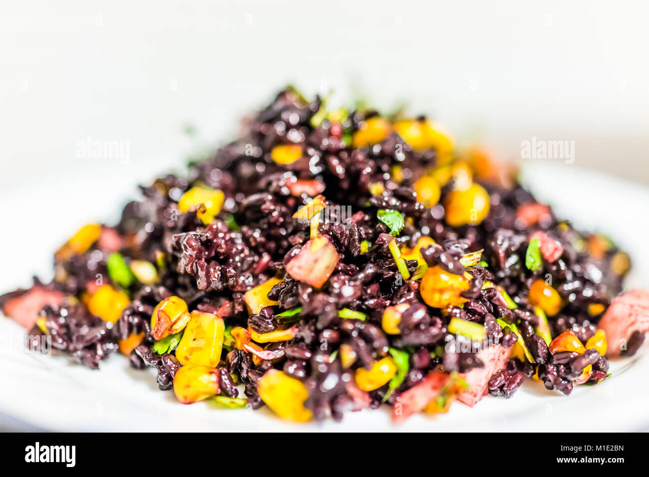 Macro closeup of forbidden Chinese black rice dish with corn ...
