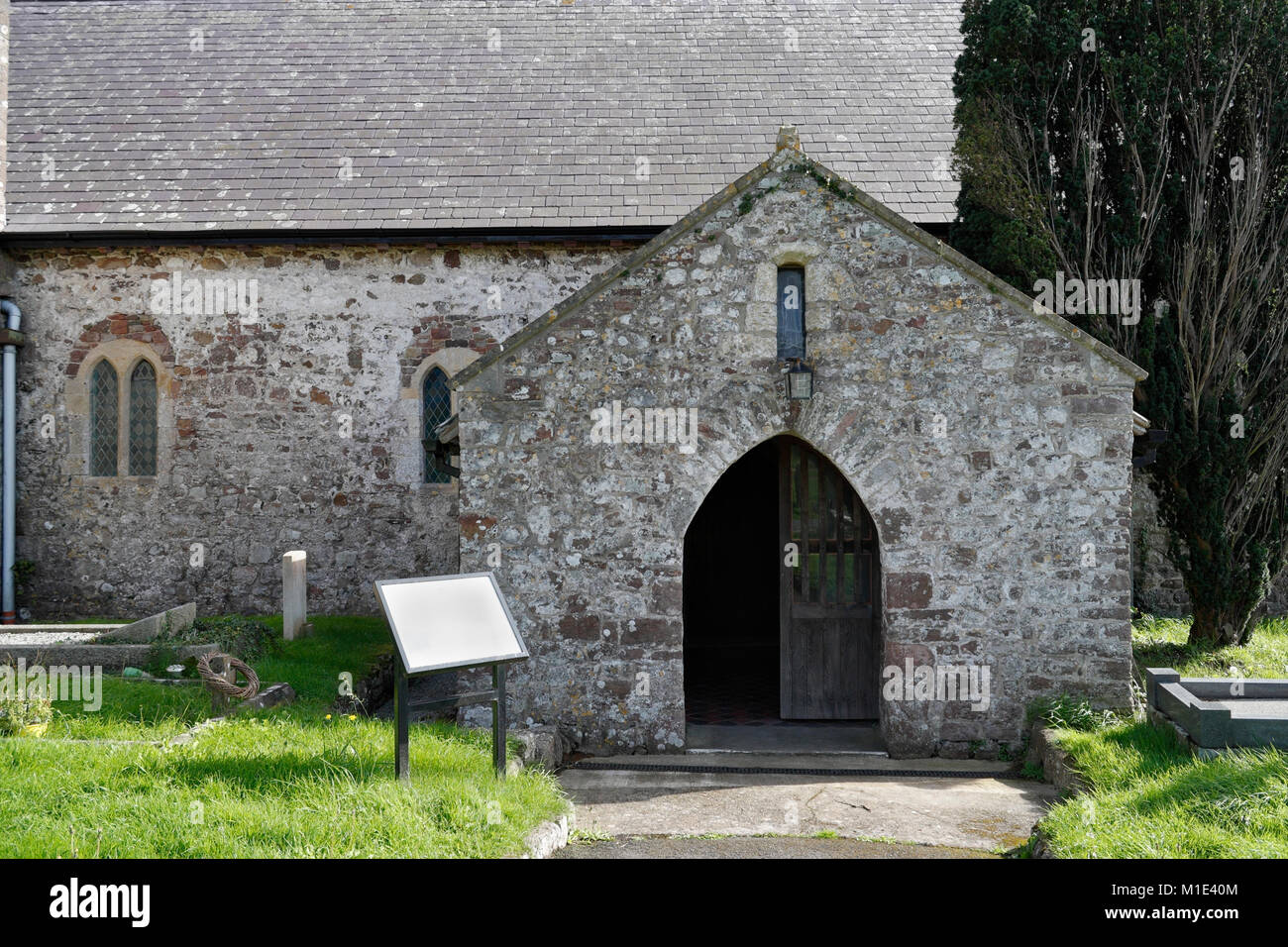 Entrance of St Cenydd's church, Llangennith, Gower, Wales UK. Welsh ...