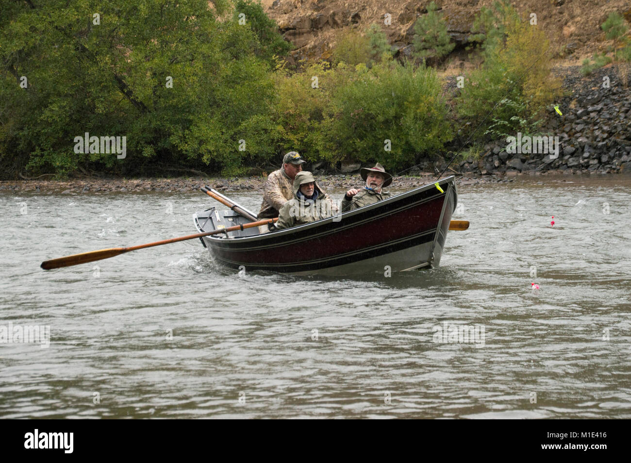 Fishing Guide Jeff Geary rows this drift boat on the Klickitat River in ...
