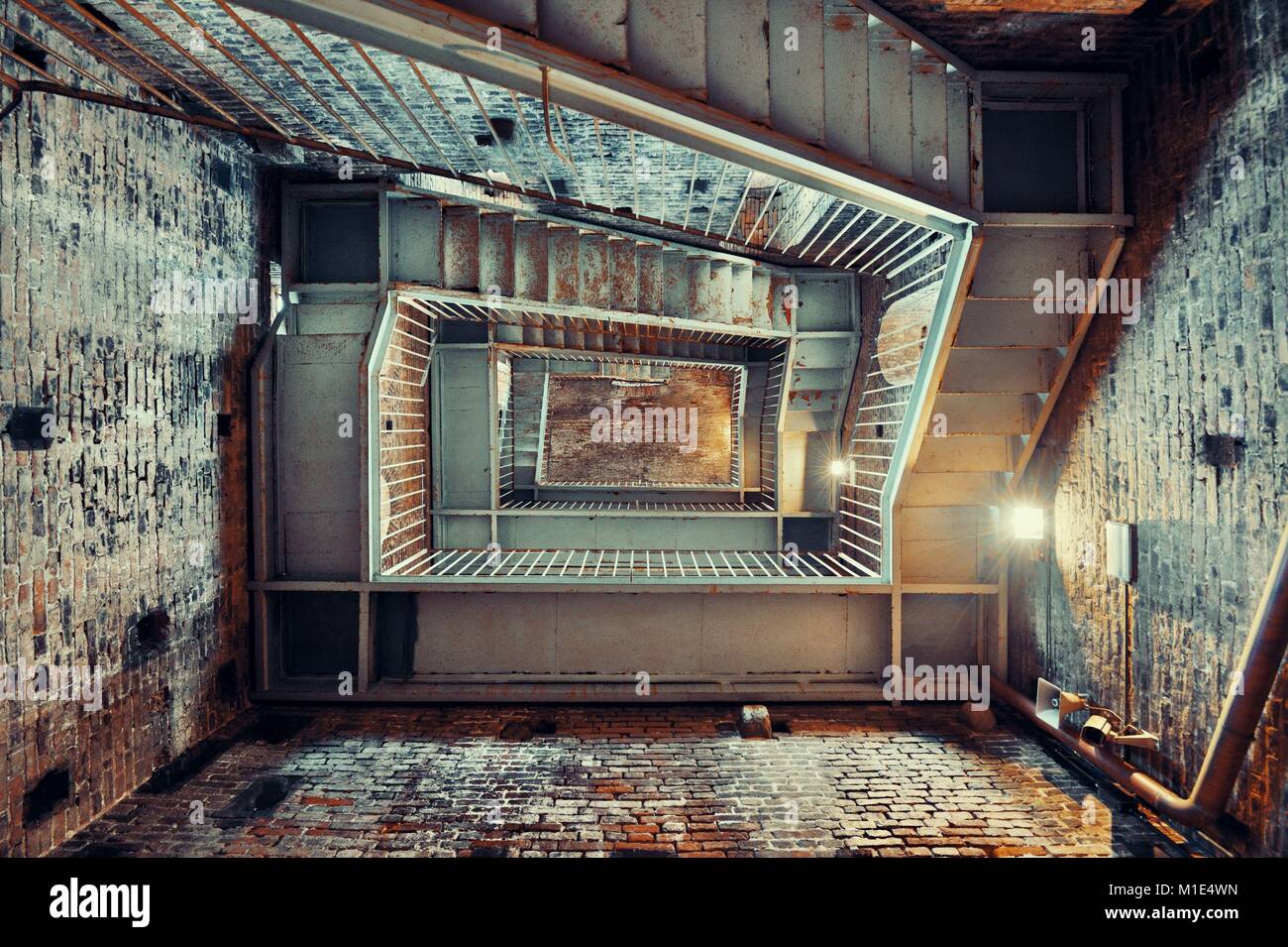Staircase inside clock tower in Lucca with historic buildings in Italy ...