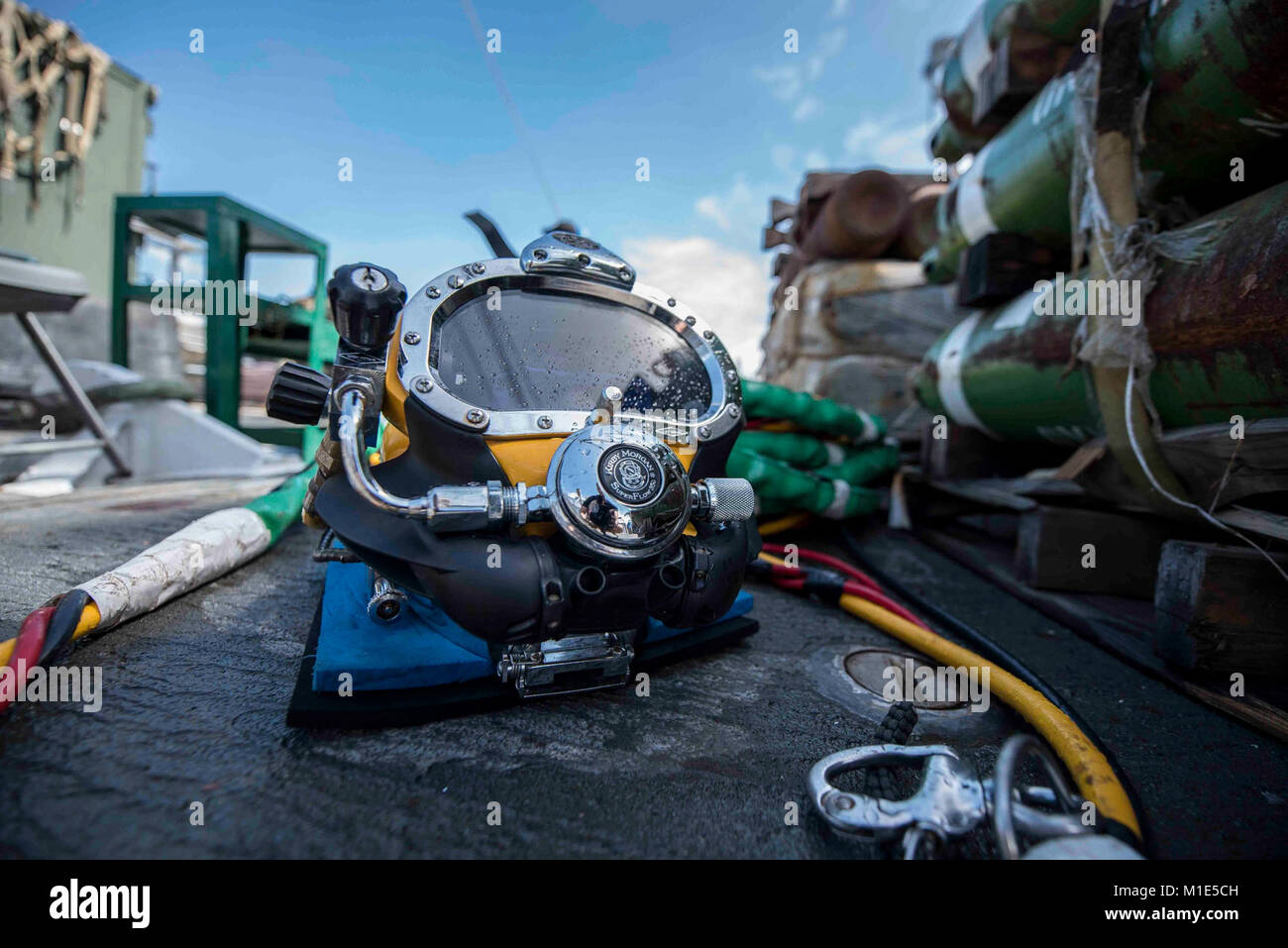 A dive helmet sits on the deck of the USNS Salvor (T-ARS-52) during an ...