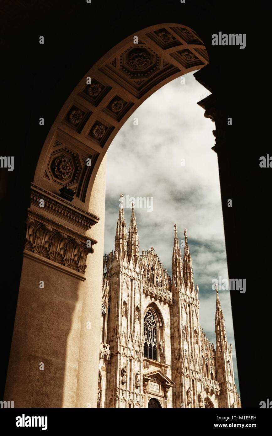 Milan Cathedral viewed through archway in Italy Stock Photo - Alamy