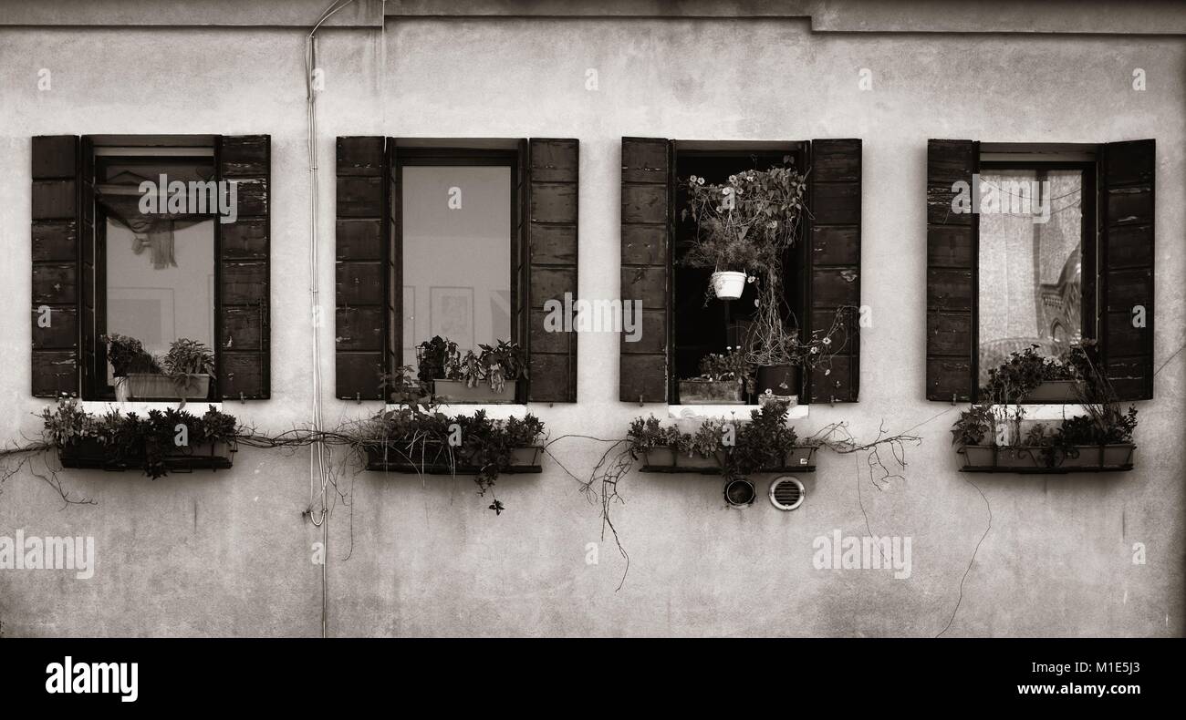 A closeup view of window in historical buildings in Venice, Italy Stock ...