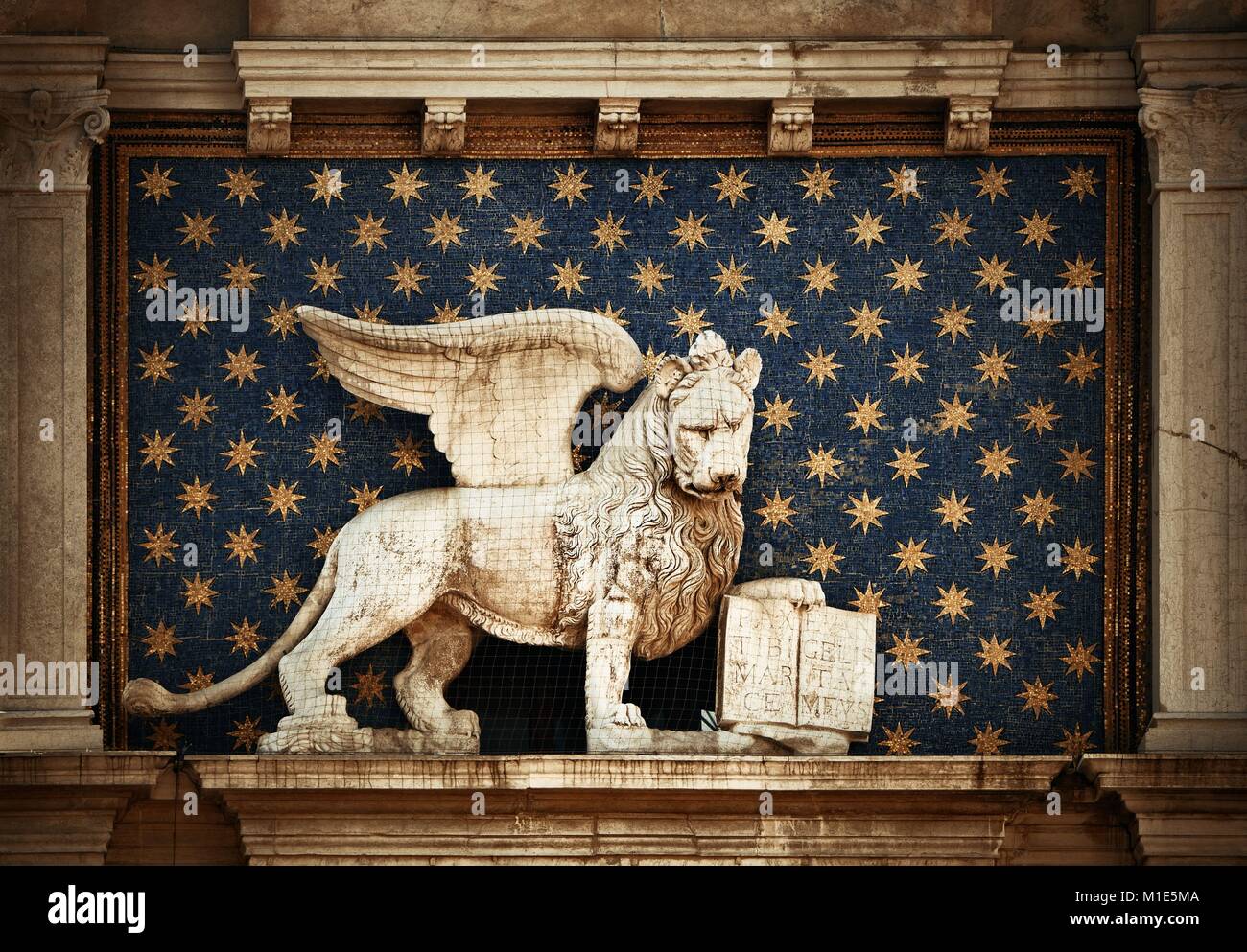 Lion of Venice statue in historical buildings at Piazza San Marco ...